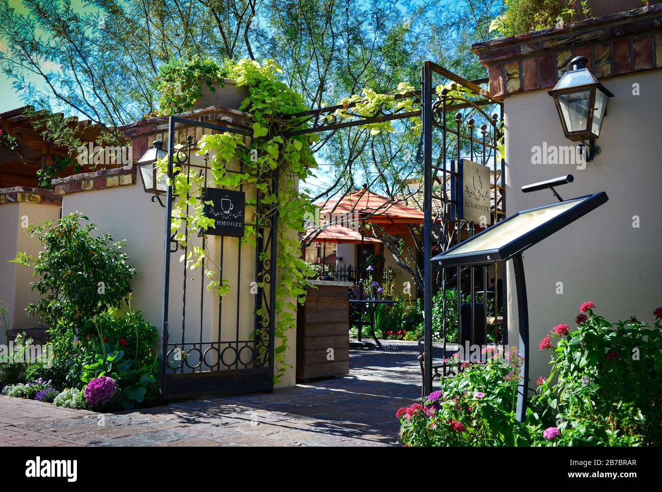 Romantically designed courtyard entry of Schmooze, Bar & Breakfast ...