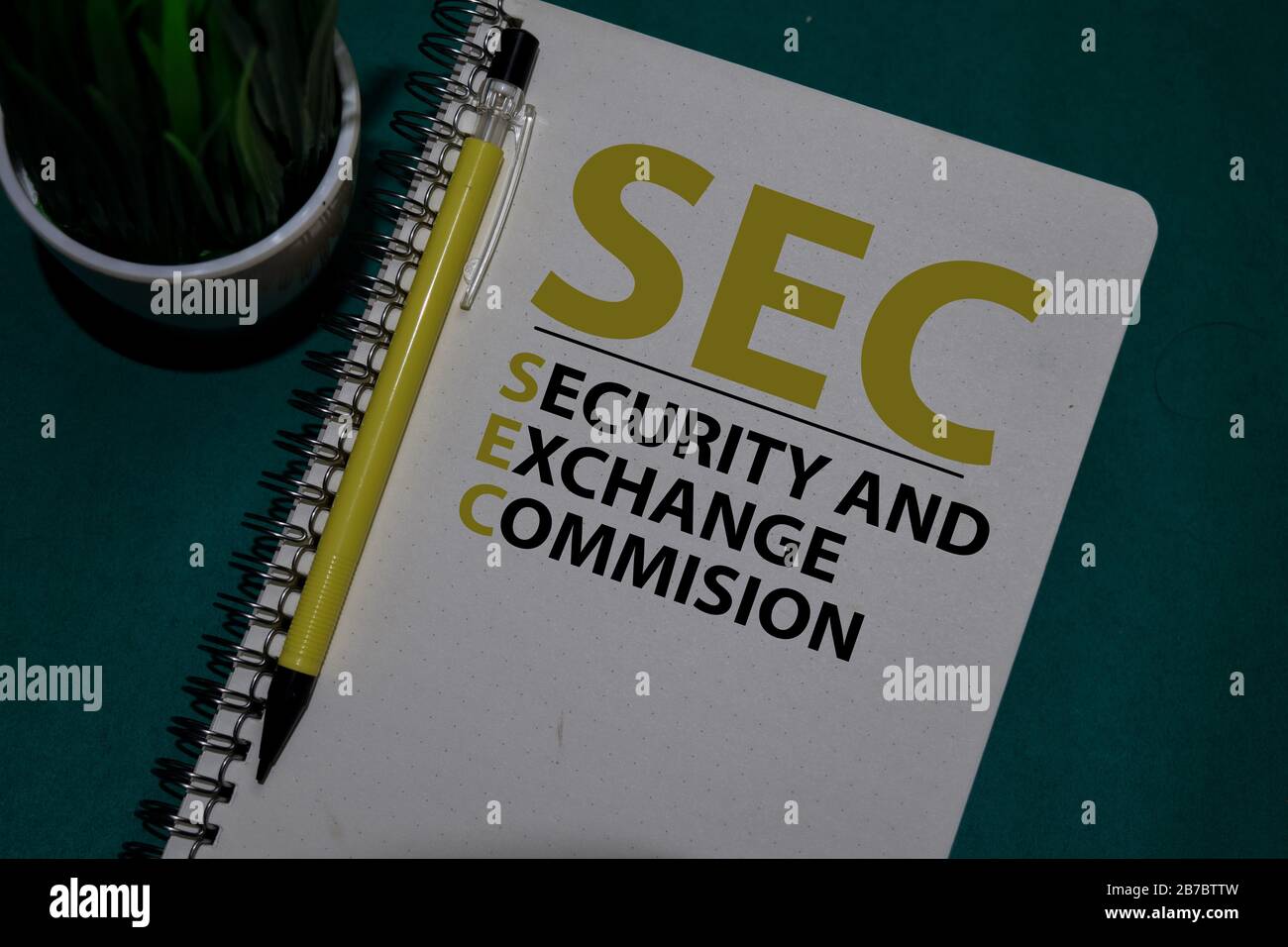 SEC - Security and Exchange Commision acronym write on a book isolated ...