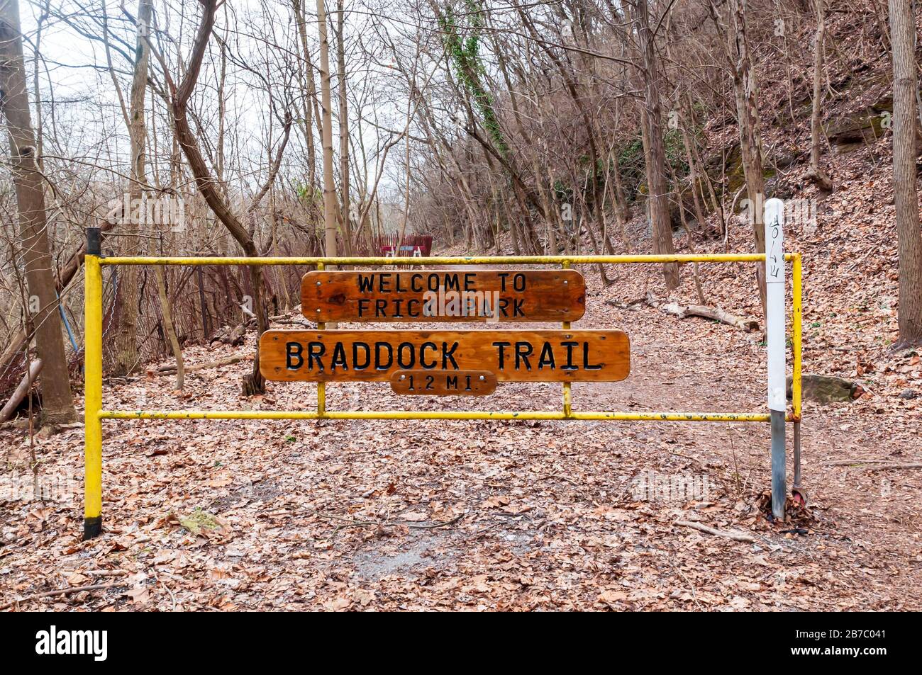 The Welcome to Frick Park Braddock Trail sign on a gate at the entrance ...