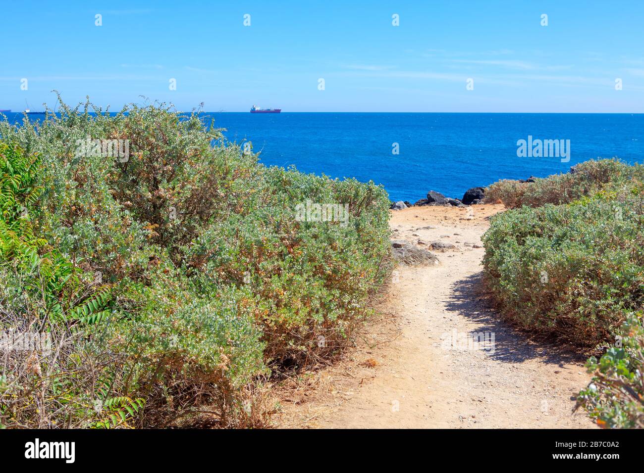 sandy path to the ocean beach Stock Photo - Alamy