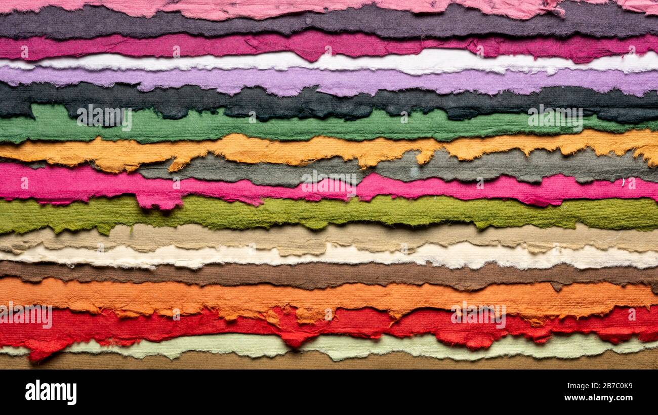 collection of colorful handmade Indian paper sheets with rough edges ...