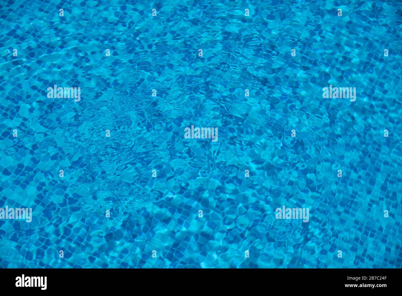 The blue water background, in the tiled bottom pool. Cyprus Stock Photo ...