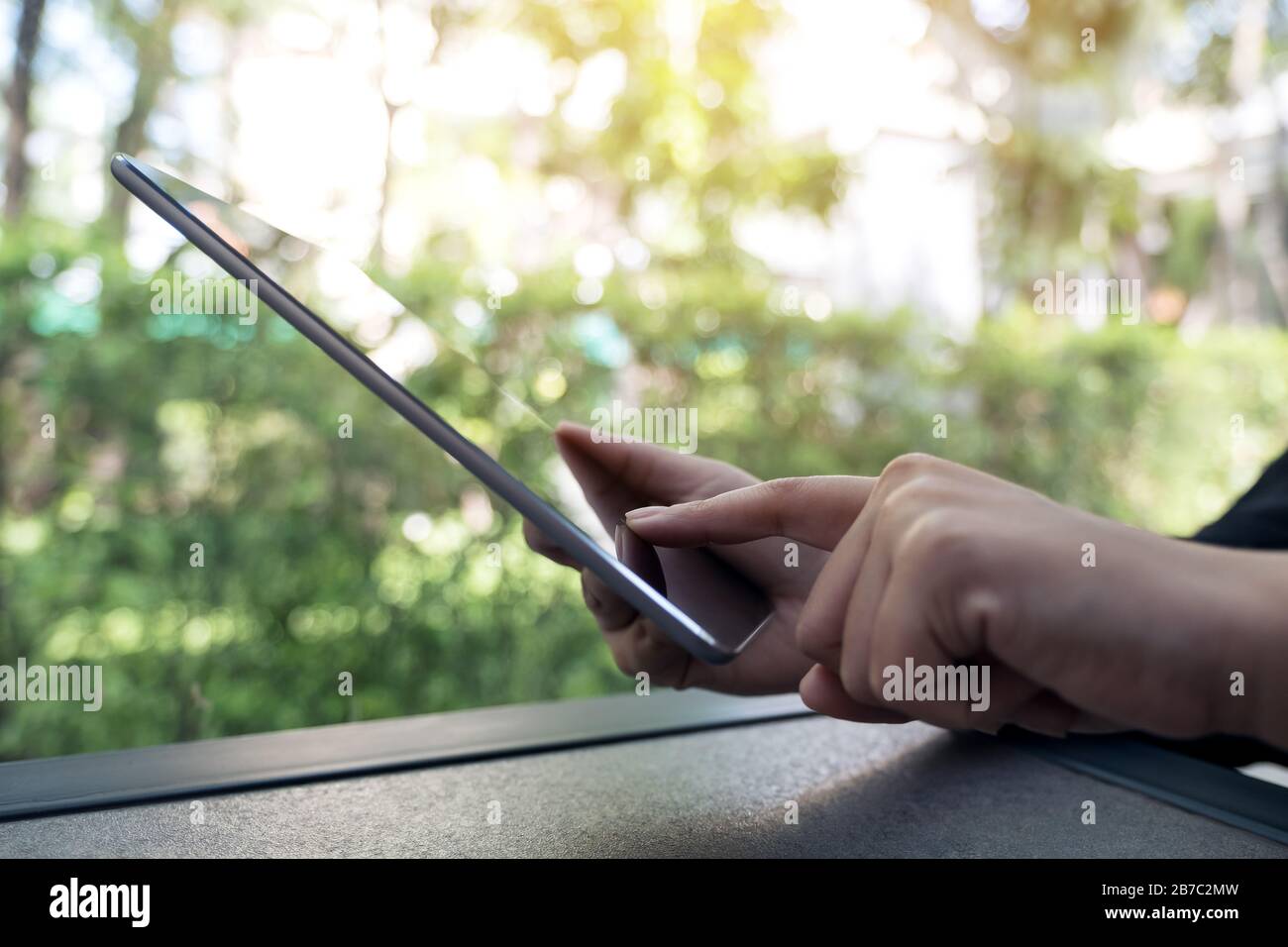 Hands using tablet pointing hi-res stock photography and images - Alamy