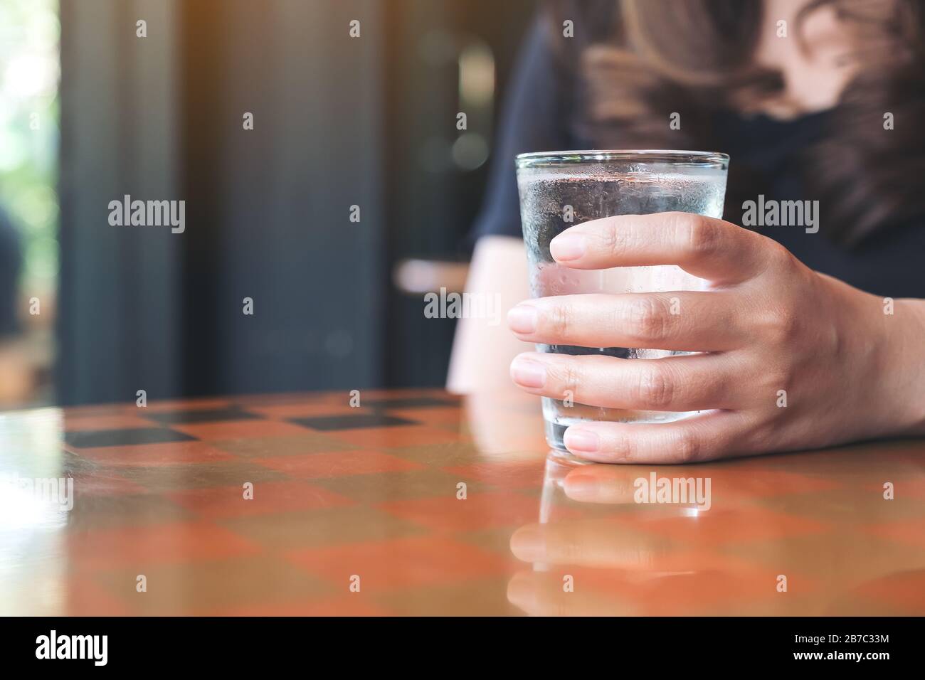 Hand grabbing a glass hi-res stock photography and images - Alamy