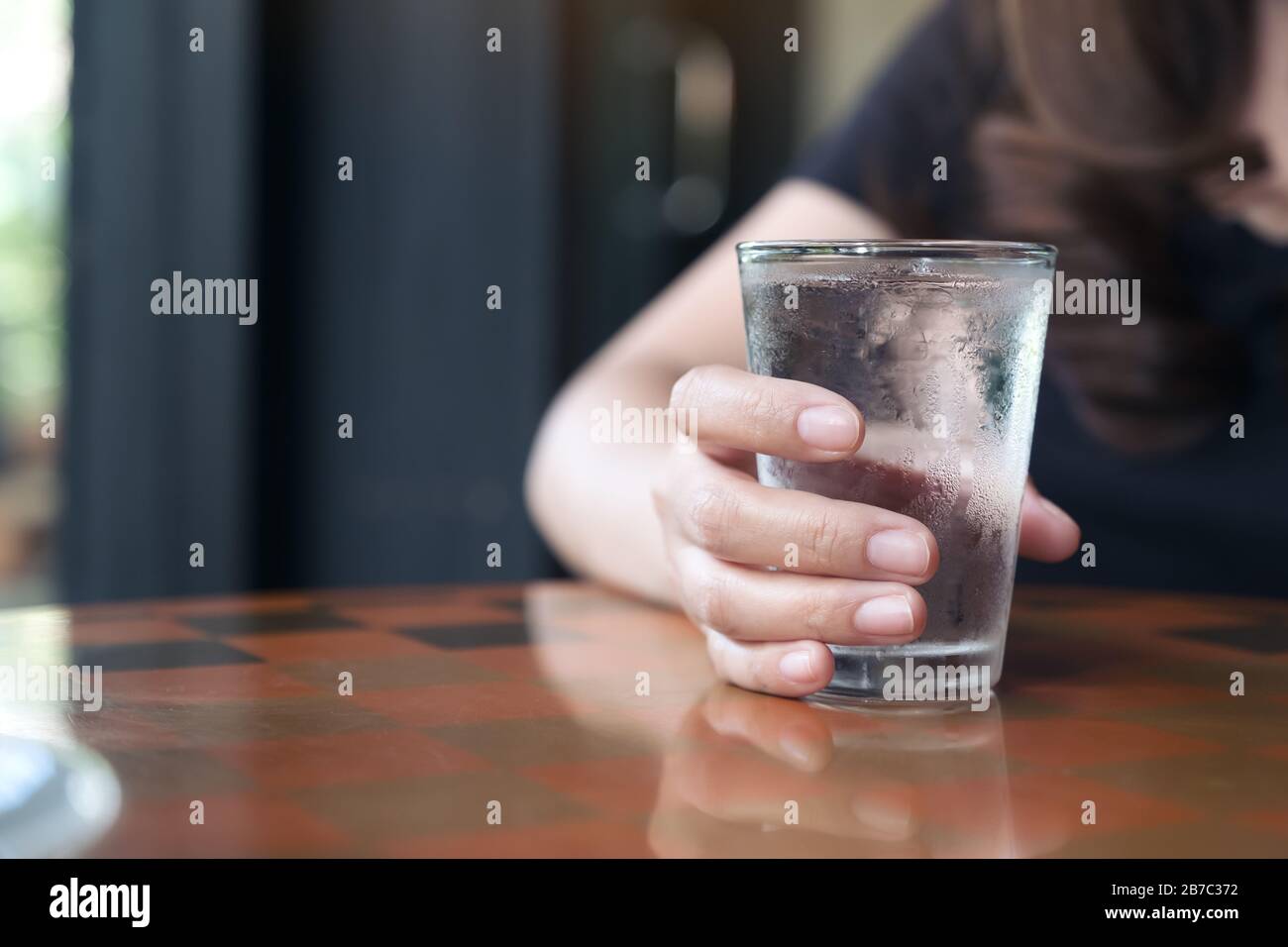 Hand grabbing a glass hi-res stock photography and images - Alamy