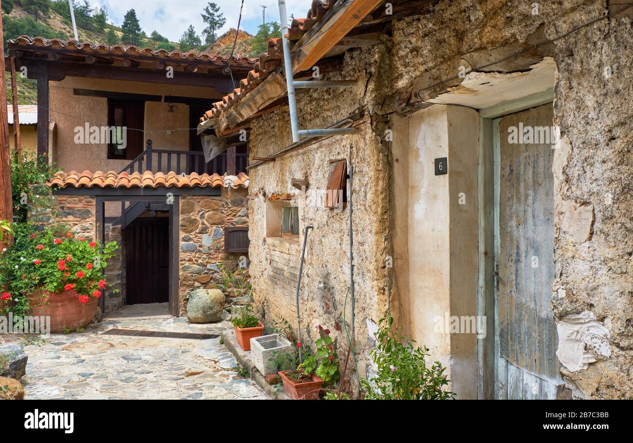 The cozy traditional residential two-store houses with wooden balconies ...