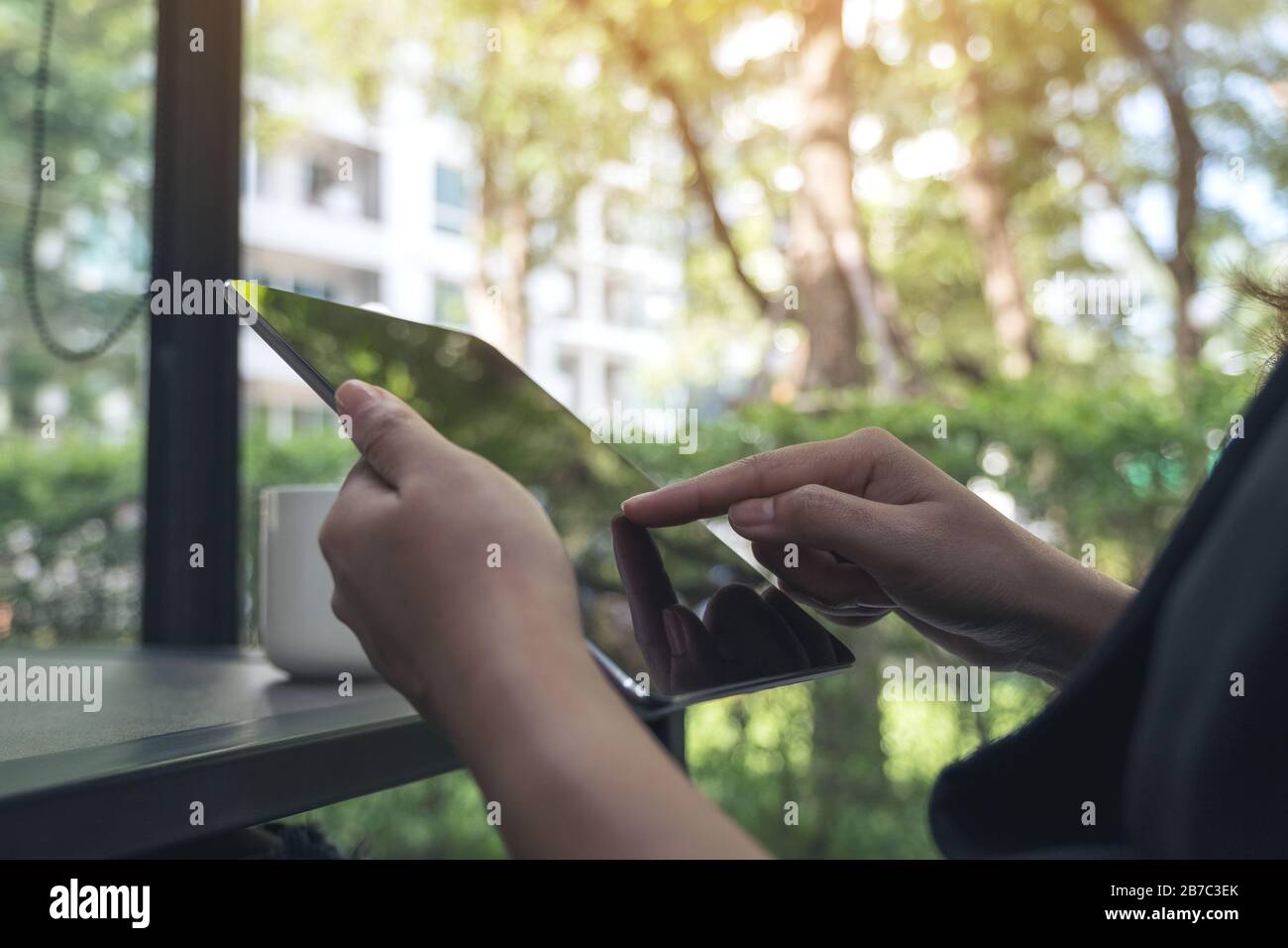 Hands using tablet pointing hi-res stock photography and images - Alamy