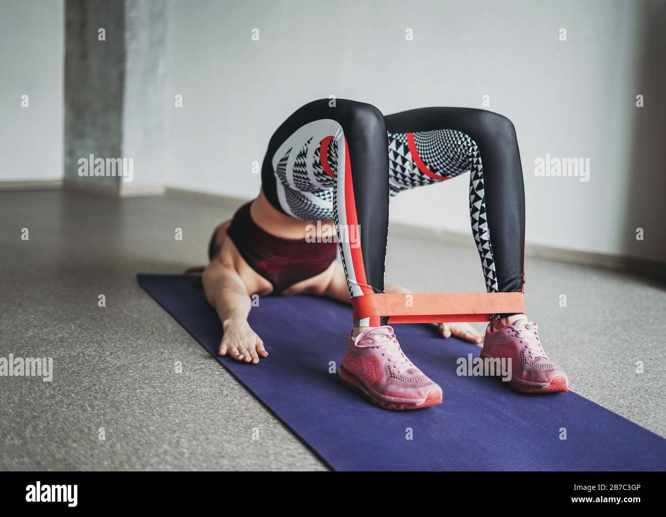 Attractive fit young woman sport wear fitness girl model doing ...