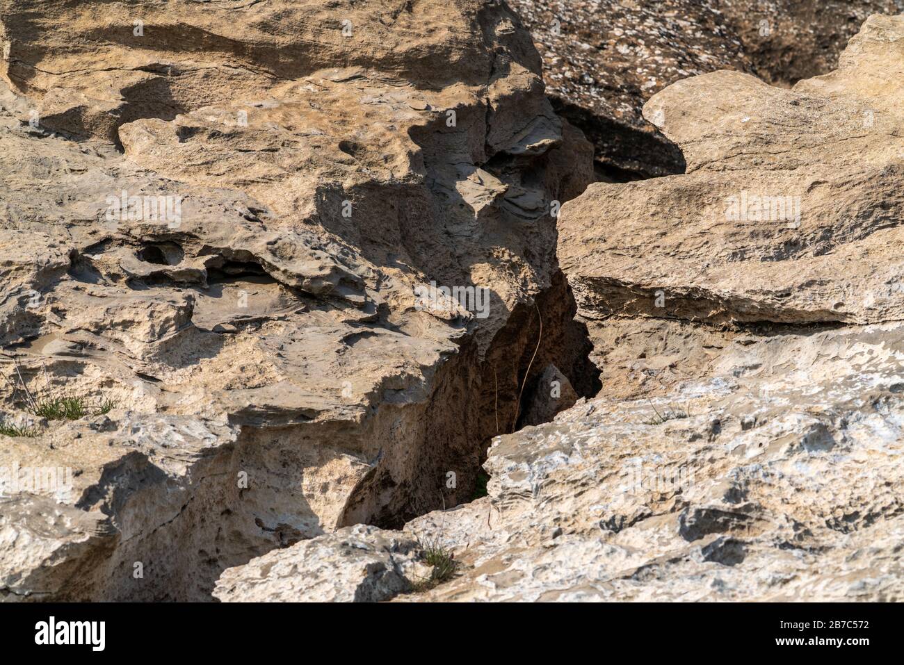 Big crack in the rock Stock Photo - Alamy