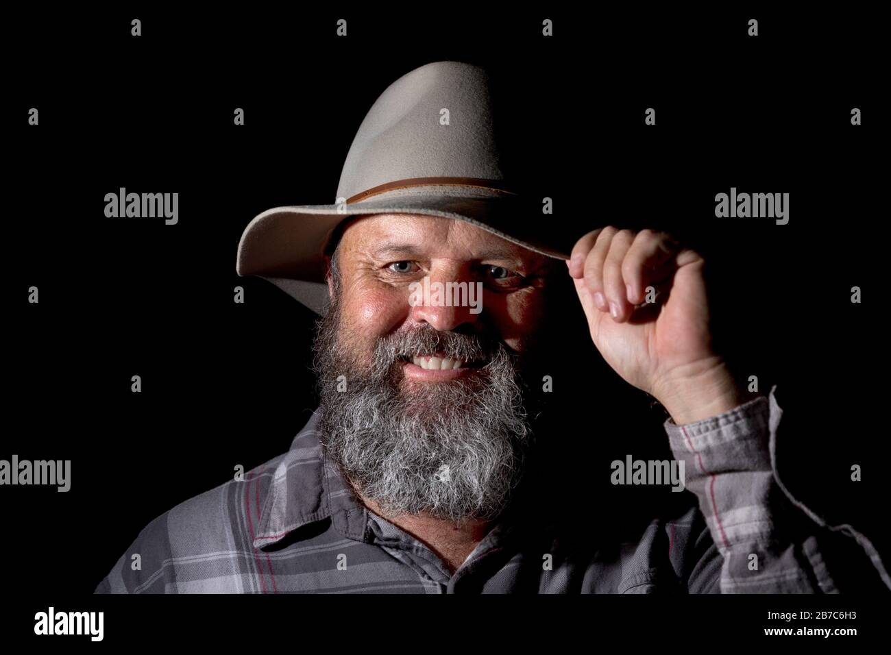 Cowboy tipping hat hi-res stock photography and images - Alamy