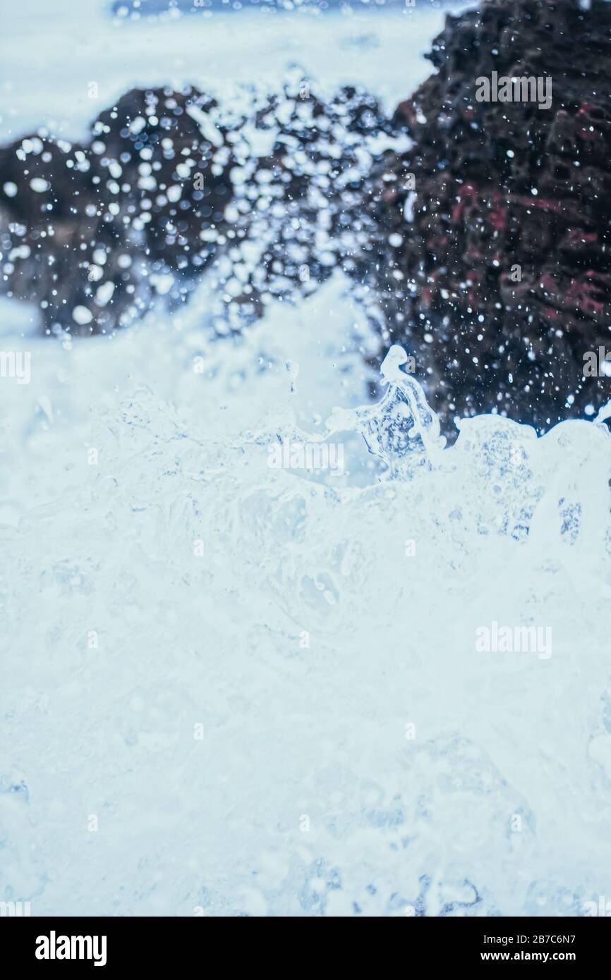Storm in the ocean, sea waves crashing on rocks on the beach coast ...