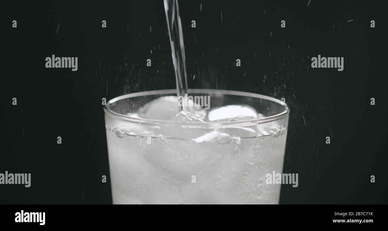 Pouring water glass slow motion hi-res stock photography and images - Alamy