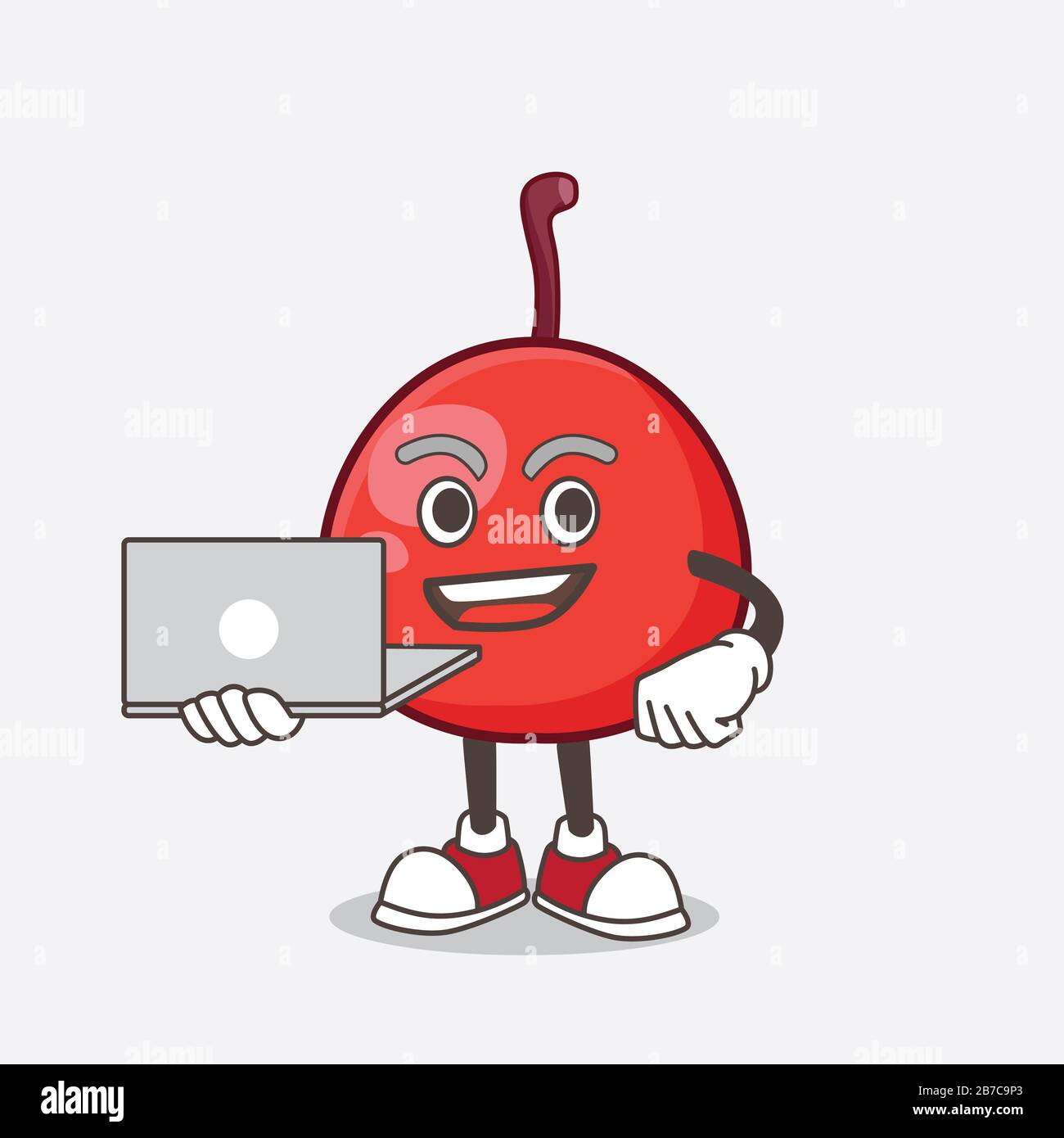 A picture of Red Berry cartoon mascot character working with laptop ...