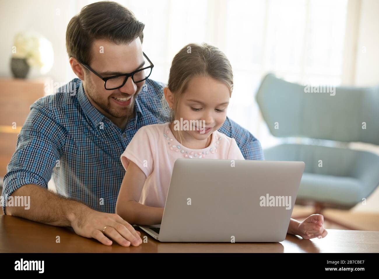 Movie with together cuddling hi-res stock photography and images - Alamy