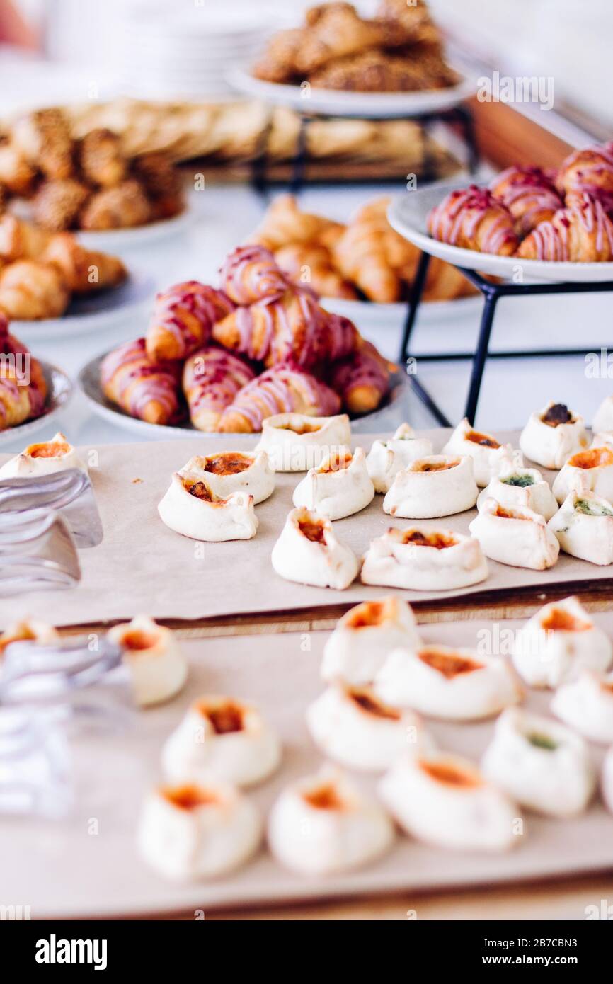 Pastry buffet served at charity event, sweet food and dessert table ...