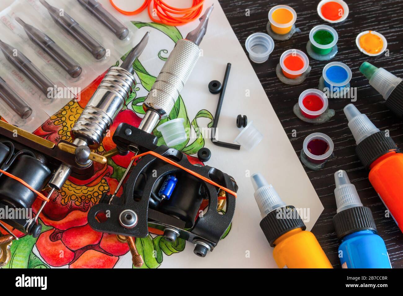 tattoo machines, ink and sketch of a tattoo Stock Photo - Alamy