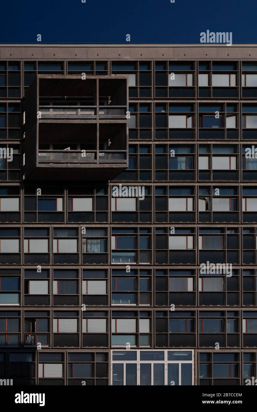 Glass panelled modern building with protruding balcony Stock Photo - Alamy