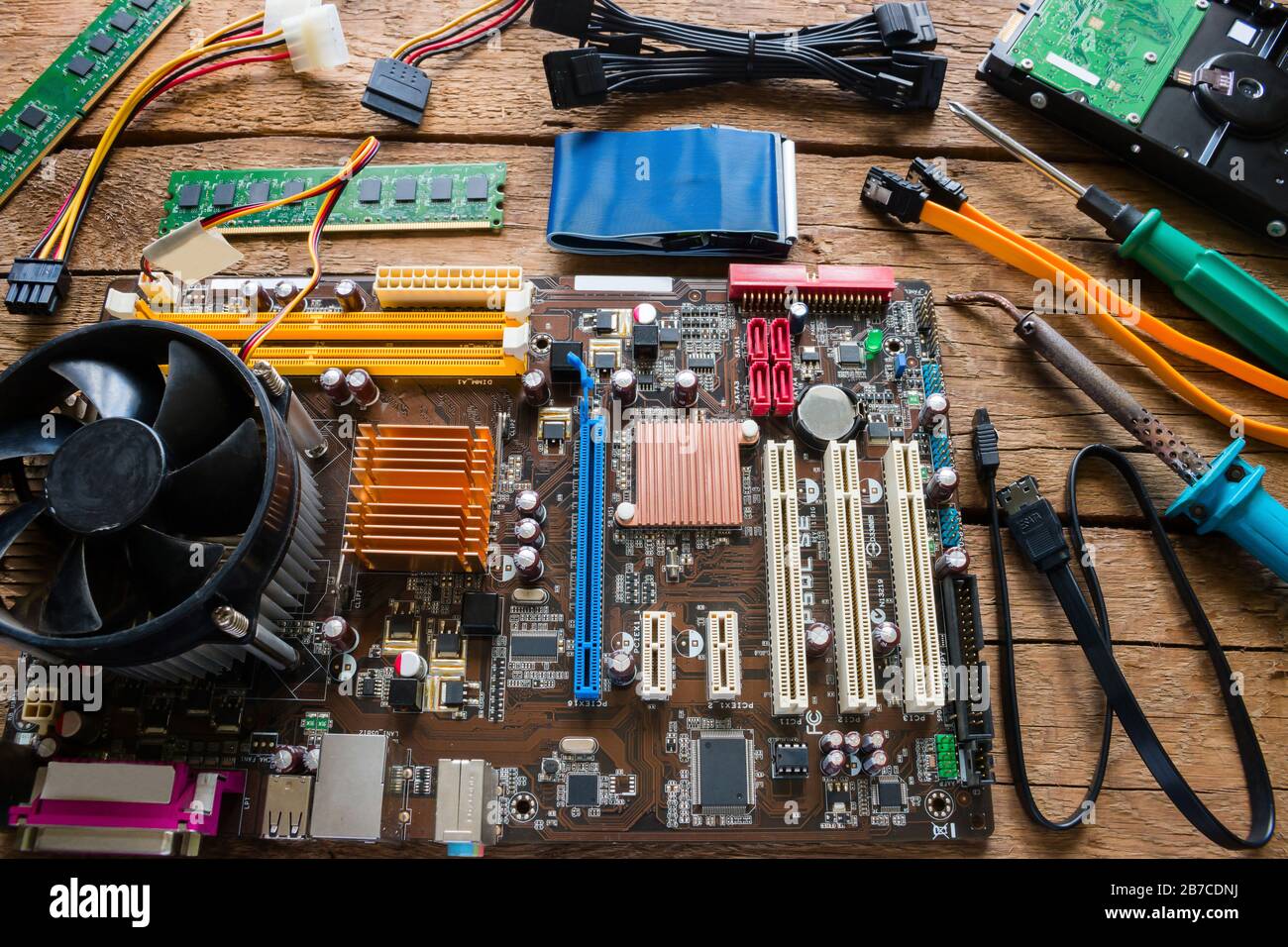 computer hardware repair on a wooden background Stock Photo - Alamy