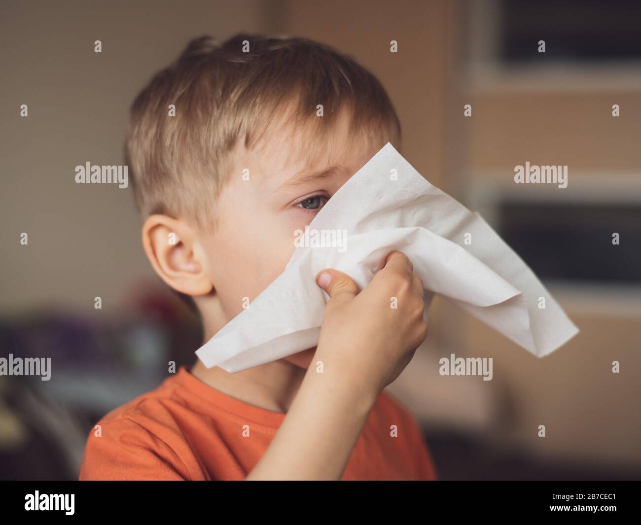 Five years old boy with allergy runny nose and glazed eyes Stock Photo ...