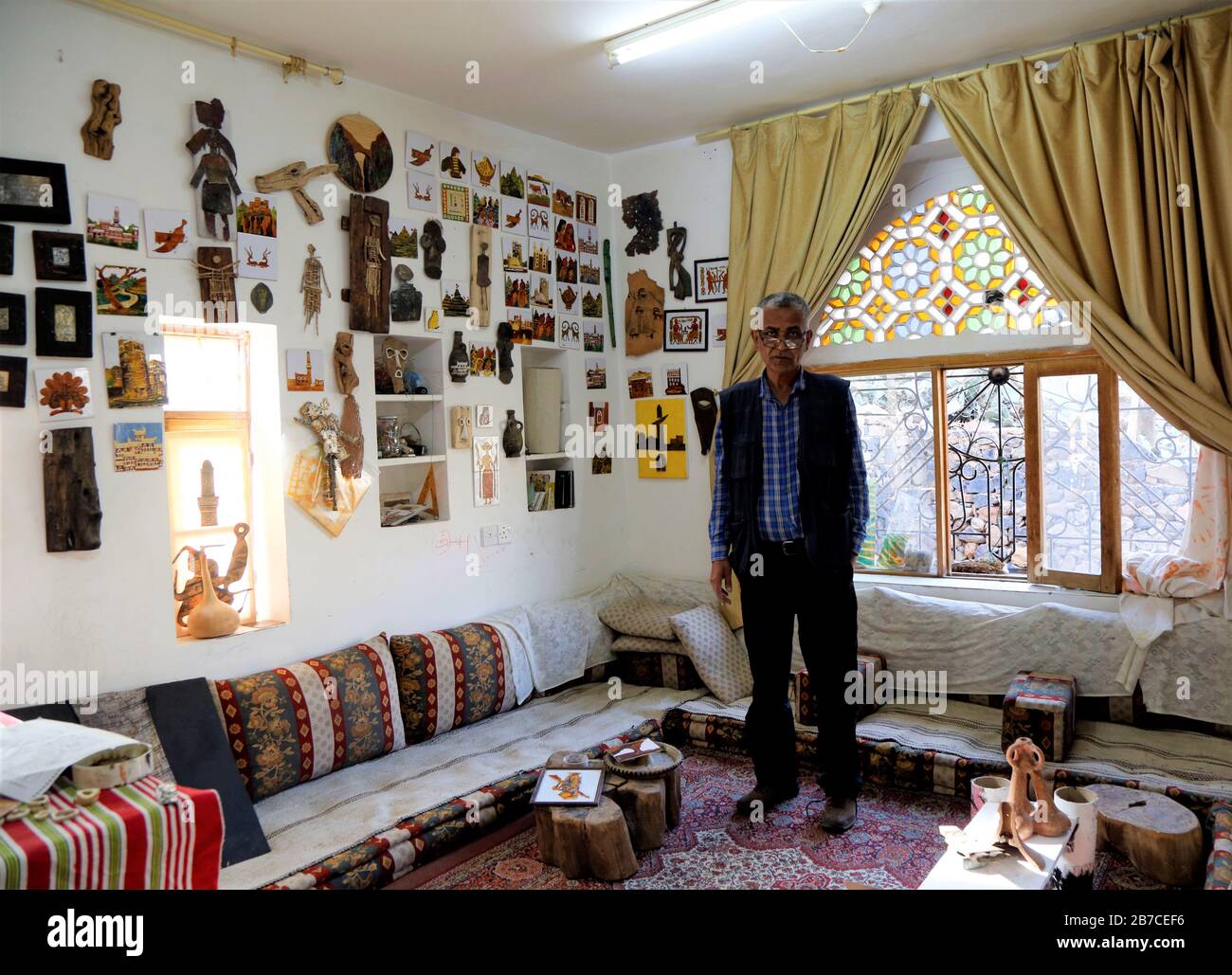 Sanaa, Yemen. 4th Mar, 2020. Yemeni artist Yassin Ghaleb stands by his ...