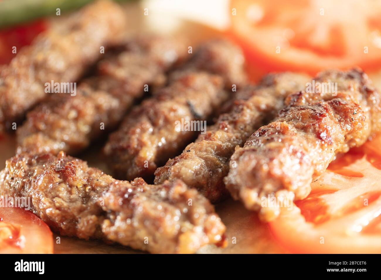 Closeup shot of kebab with blurry background. Food photography Stock ...