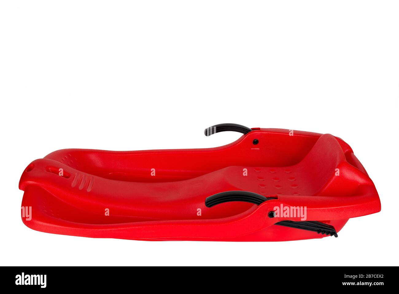 Red plastic sled hi-res stock photography and images - Alamy
