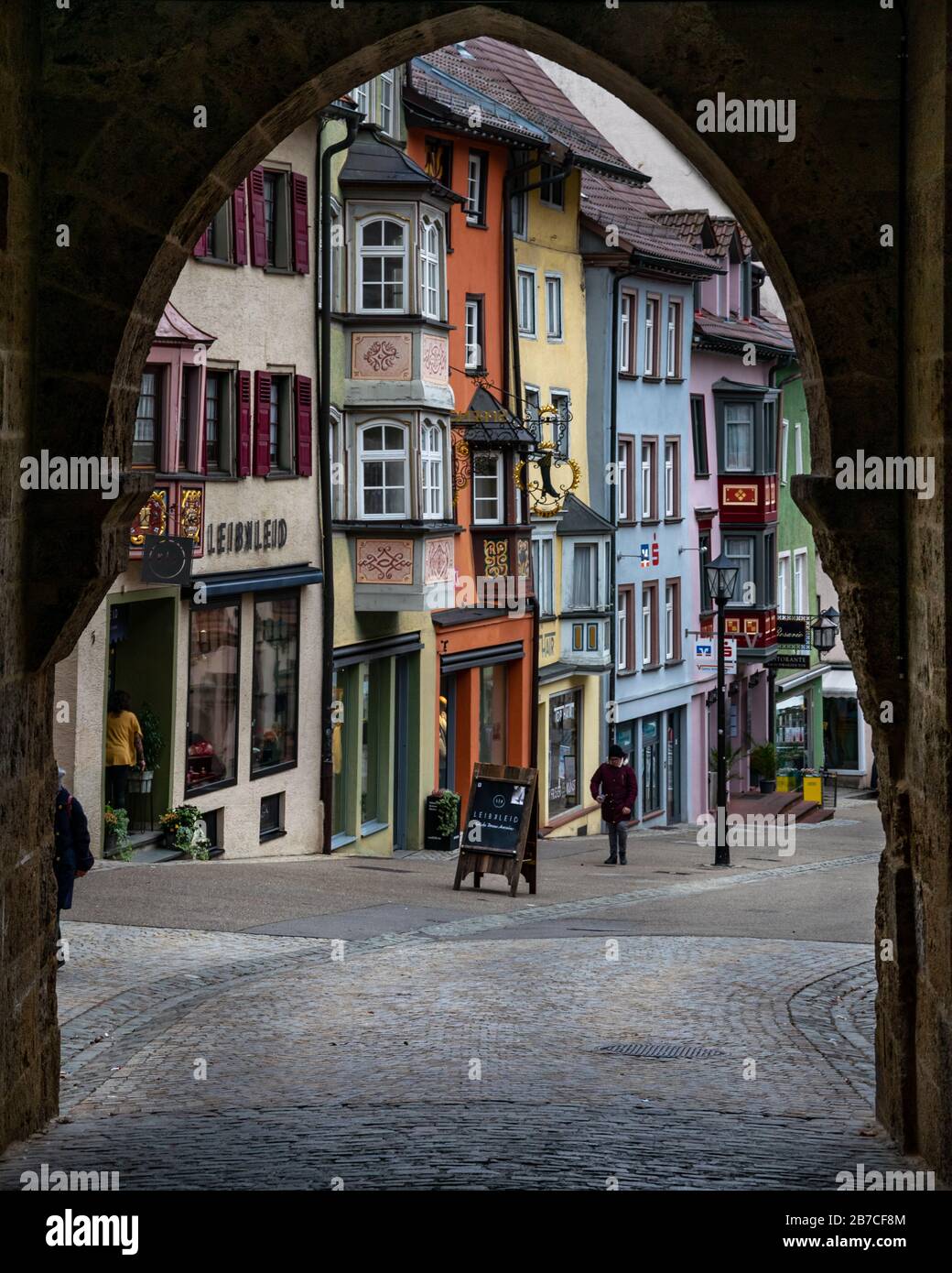 Medieval houses in Germany framed by an arch. Colourful buildings in ...
