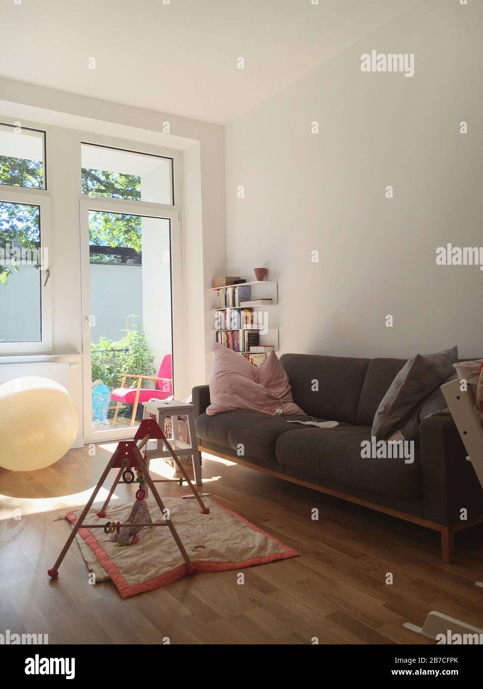 Couch vertical window wood floor hi-res stock photography and images ...