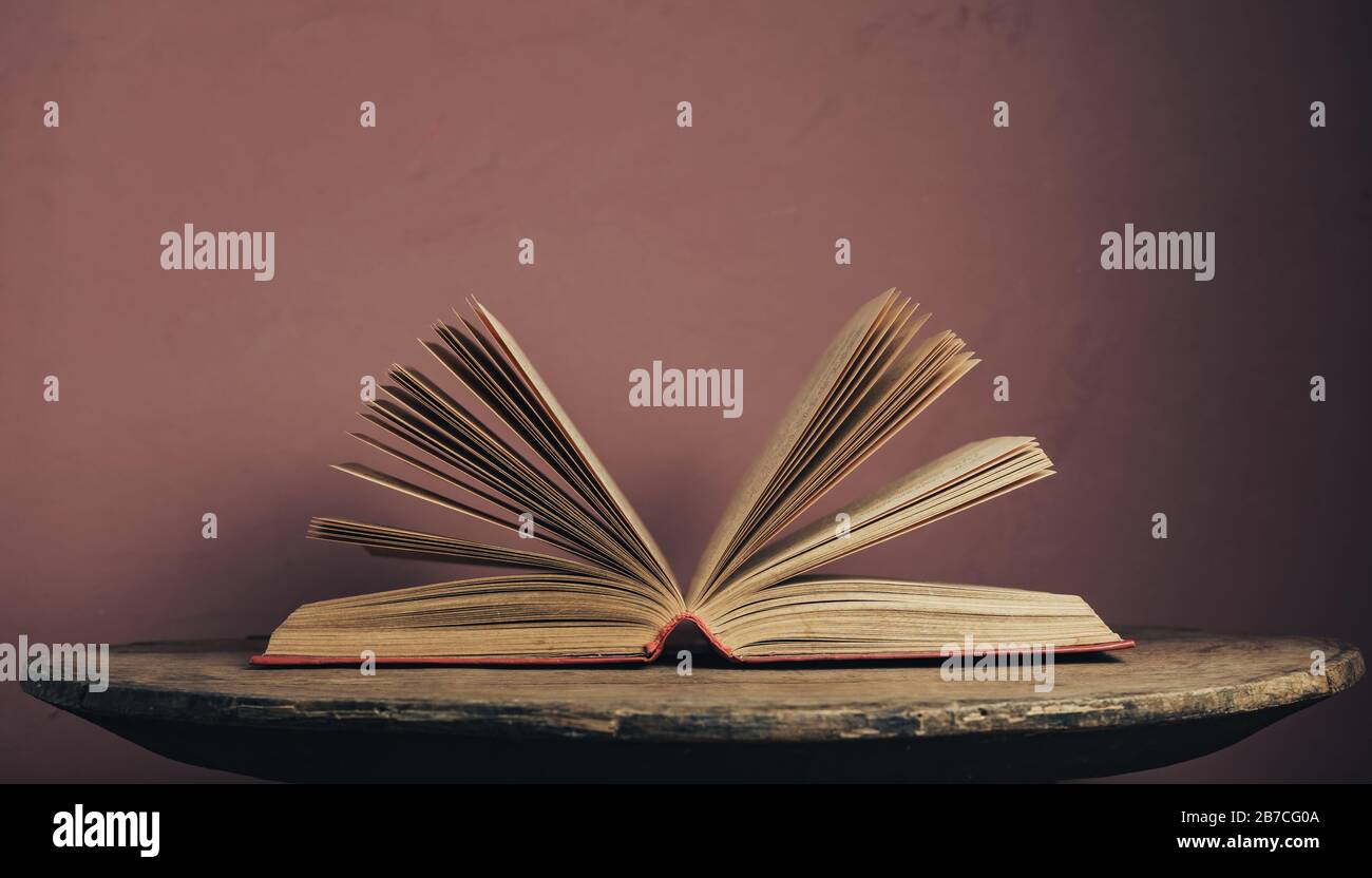 Open vintage ancient book. Pattern background for design. The book on a ...