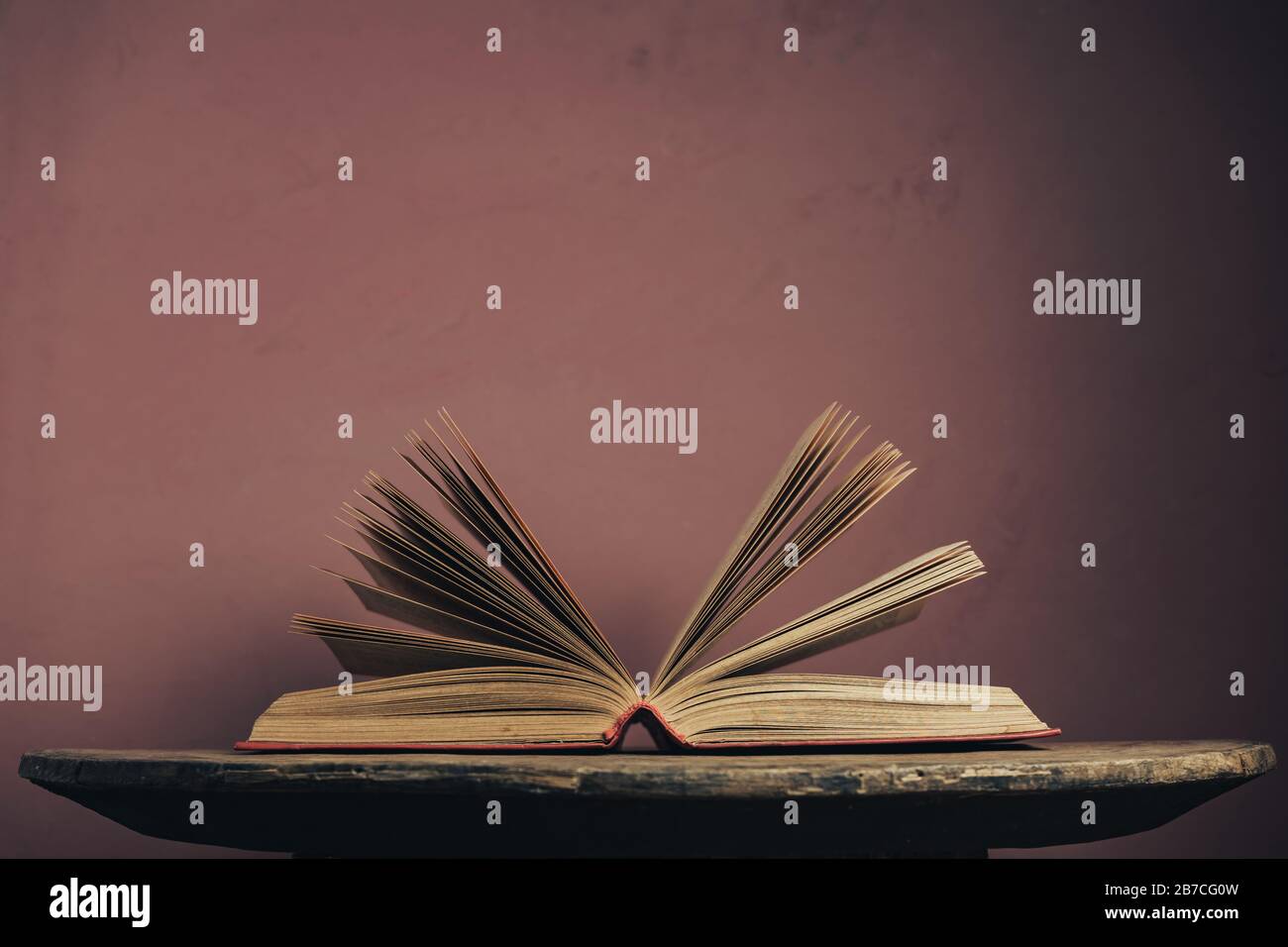 Open vintage ancient book. Pattern background for design. The book on a ...