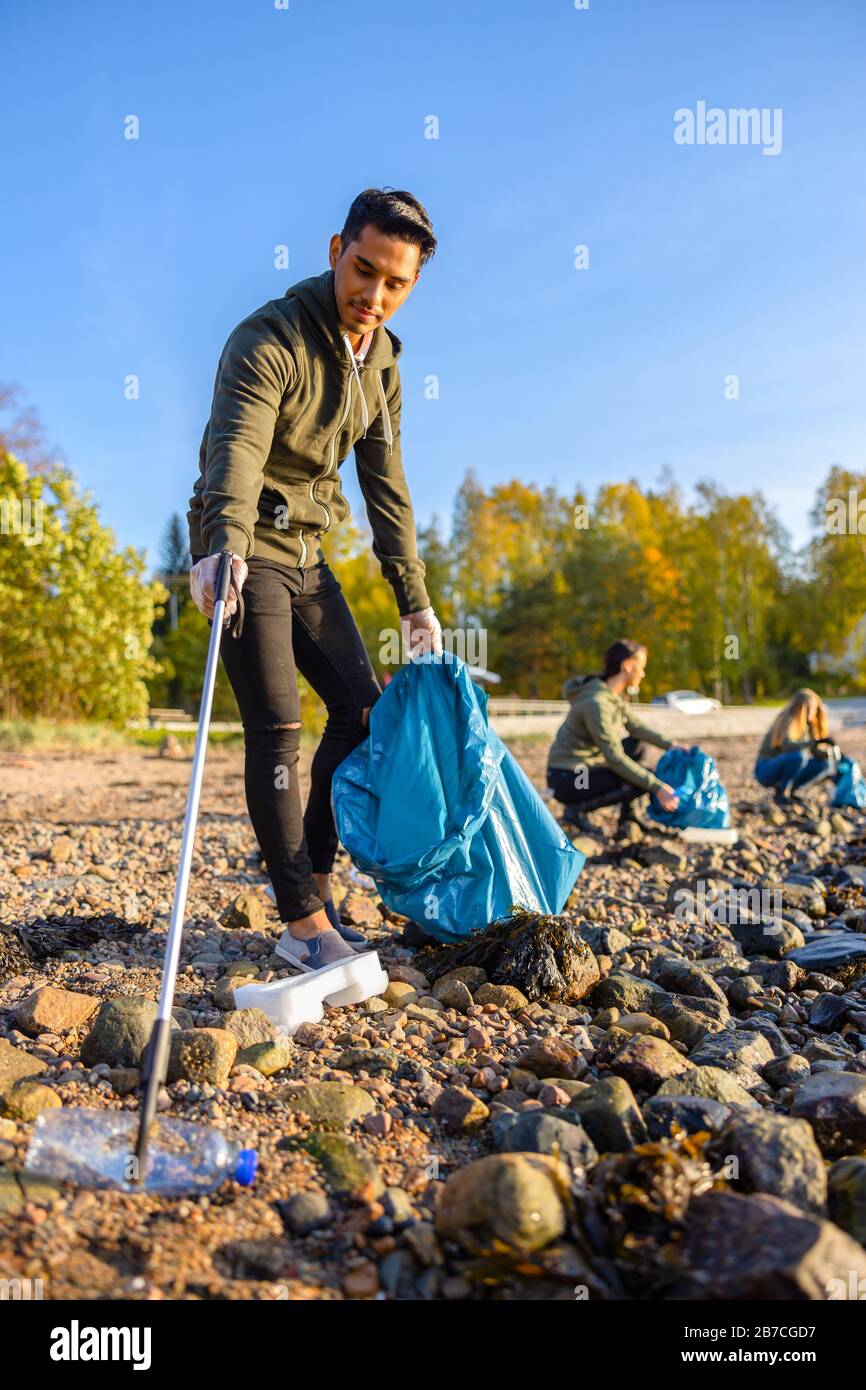 Cleaning beach hi-res stock photography and images - Alamy