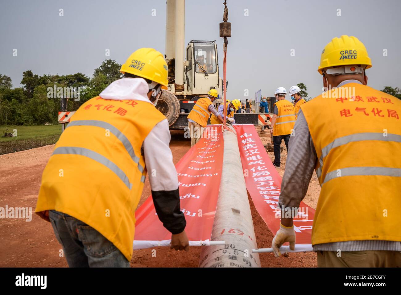 Vientiane, Laos. 15th Mar, 2020. Workers prepare to plant the first ...