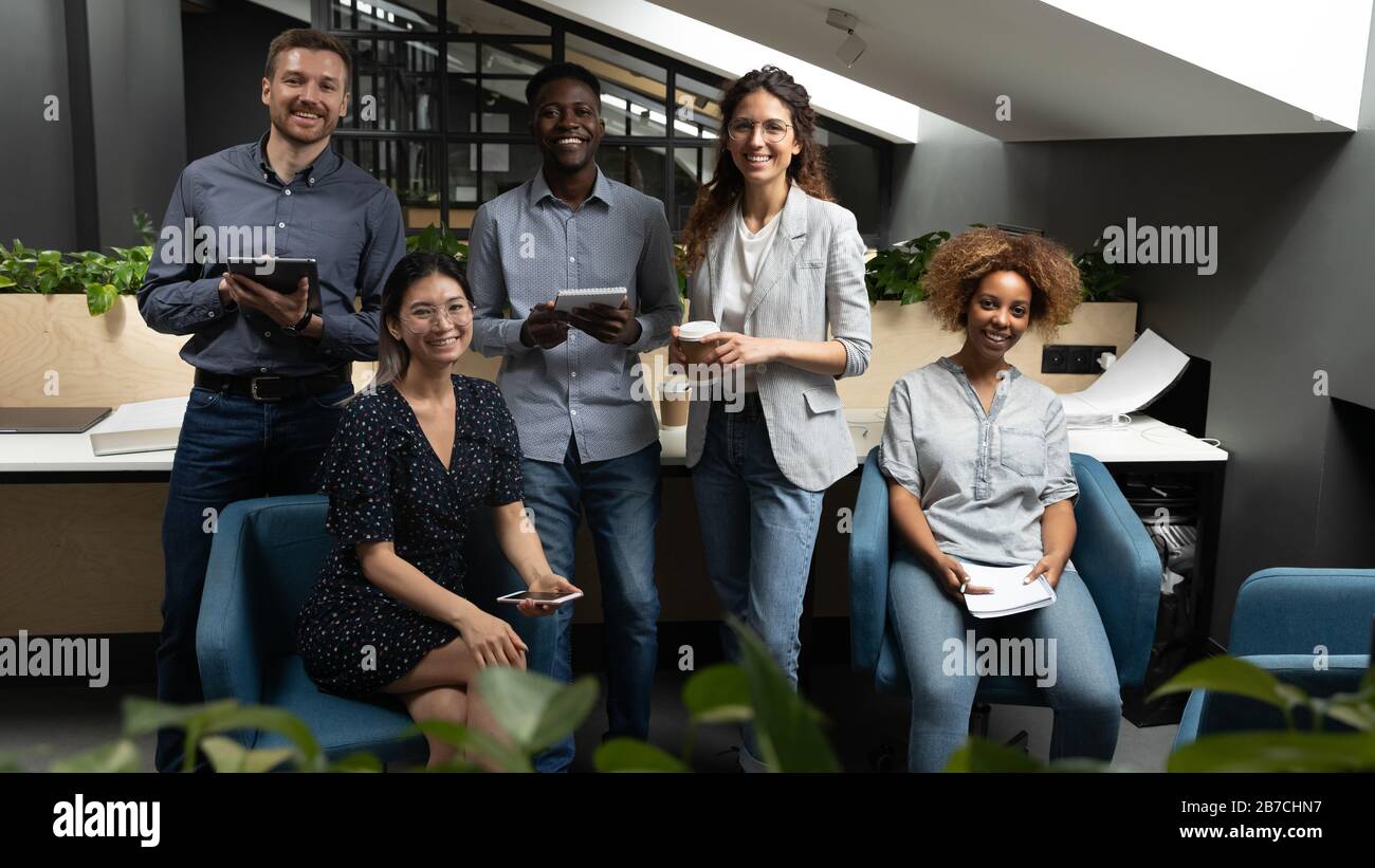 Startup team posing photo in hi-res stock photography and images - Alamy
