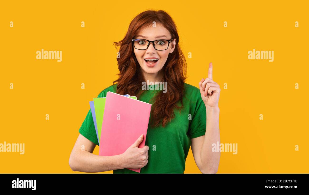 Geek Student Girl Having Idea Standing On Yellow Background, Panorama ...
