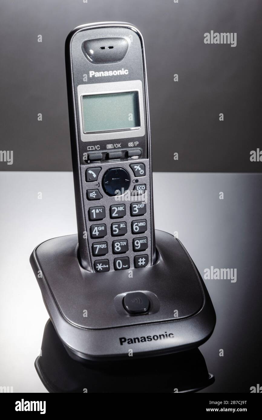 Panasonic dial telephone on gradient background. Panasonic Corporation ...