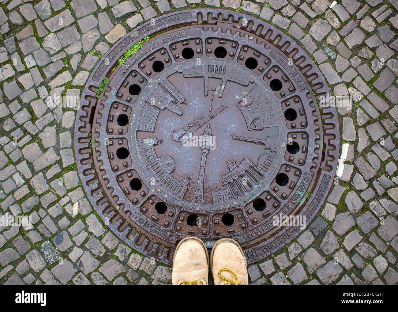 A drain hole cover depicting all of Berlin's landmark monuments Stock ...