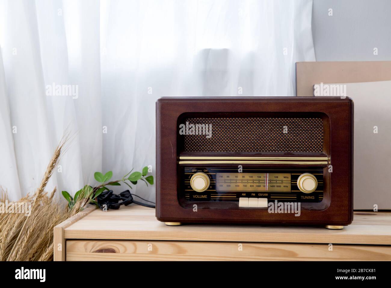 old vintage radio with shelf on the wooden cabinet Stock Photo - Alamy