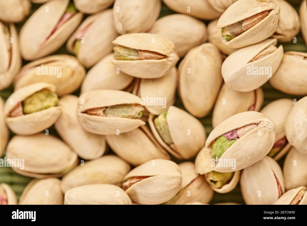 food background texture of pistachios close-up Stock Photo - Alamy