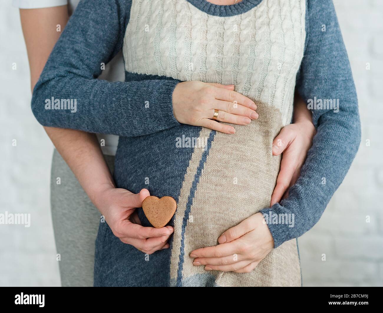 Young couple expecting baby. Pregnant woman with husband. pregnancy people and expectation ...