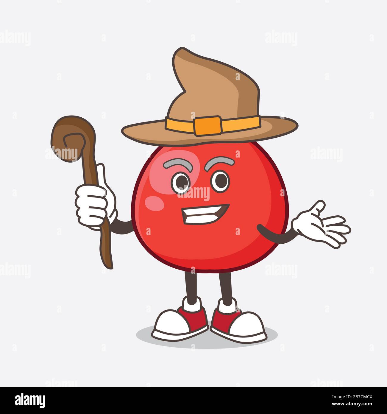 A picture of Red Berry cartoon mascot character as a witch on the stage ...