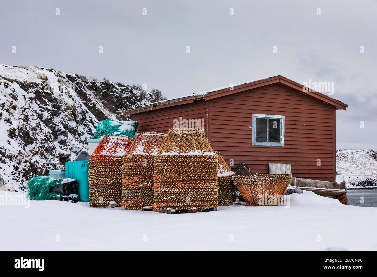 Fishing stage with crab pots along shore in English Harbour of ...