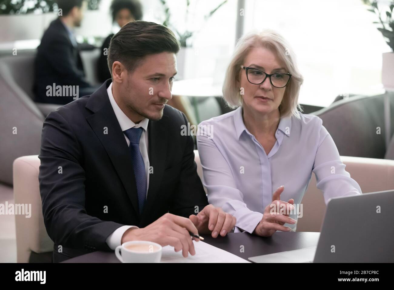 Business people discuss project using hi-res stock photography and ...