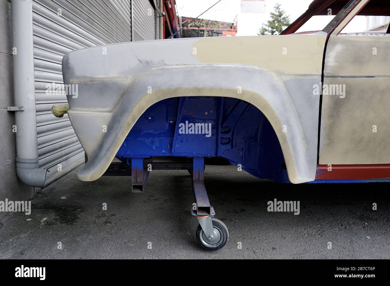 Classic vintage wrecked junk cars in the street Stock Photo - Alamy