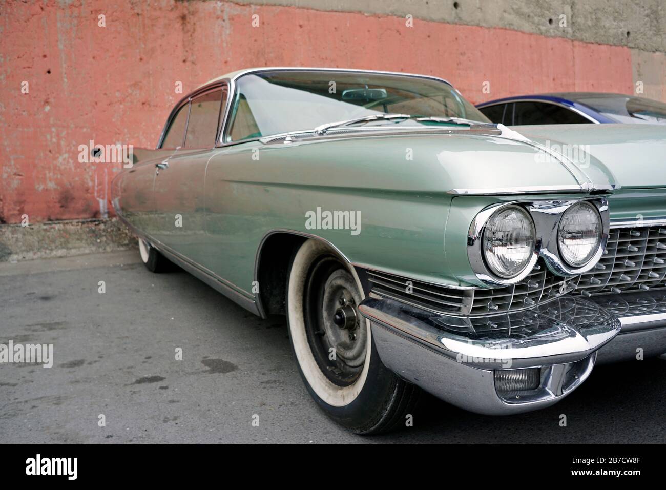 Classic vintage wrecked junk cars in the street Stock Photo - Alamy