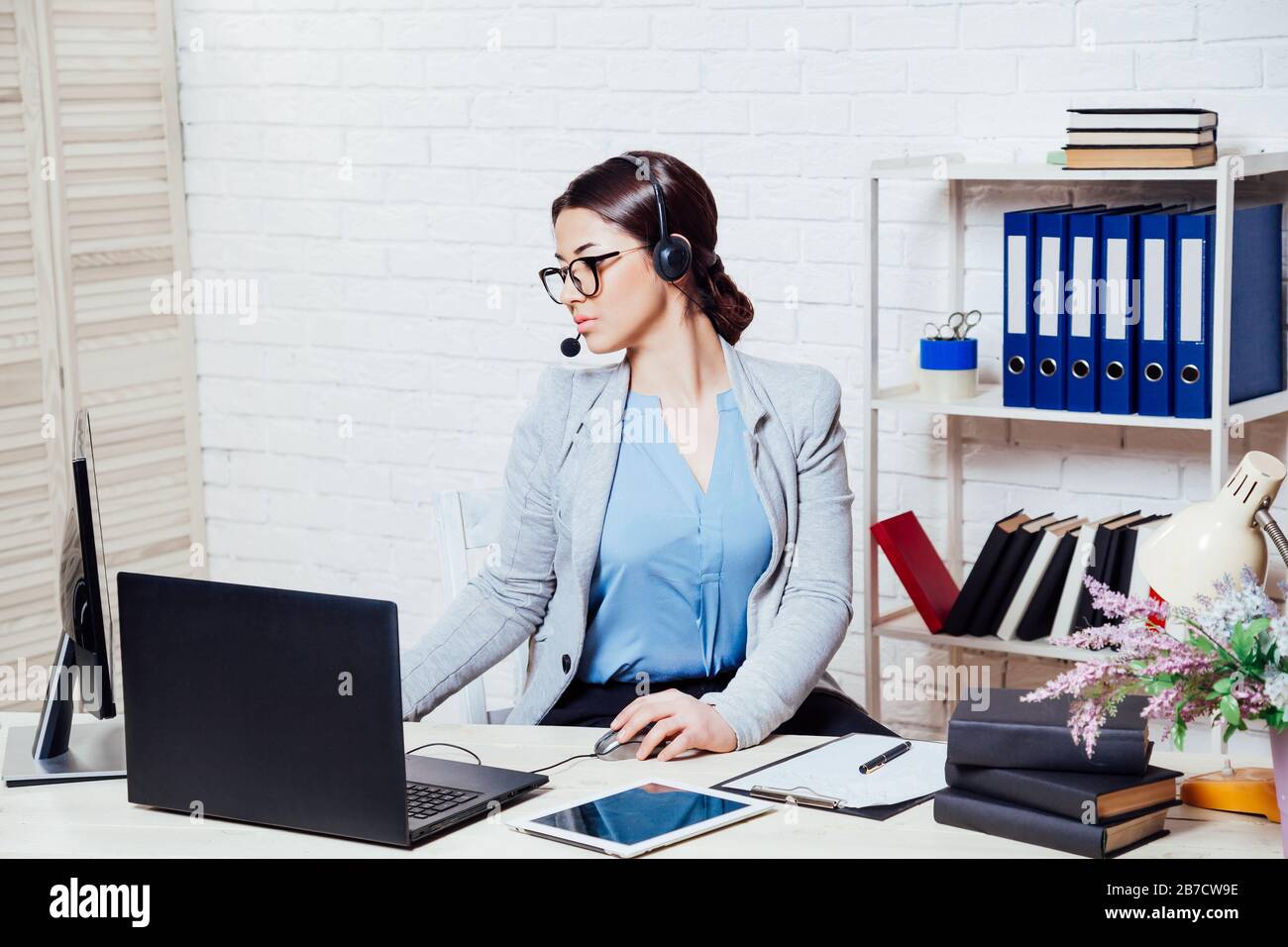girl in the workplace at the computer in the Office Stock Photo - Alamy