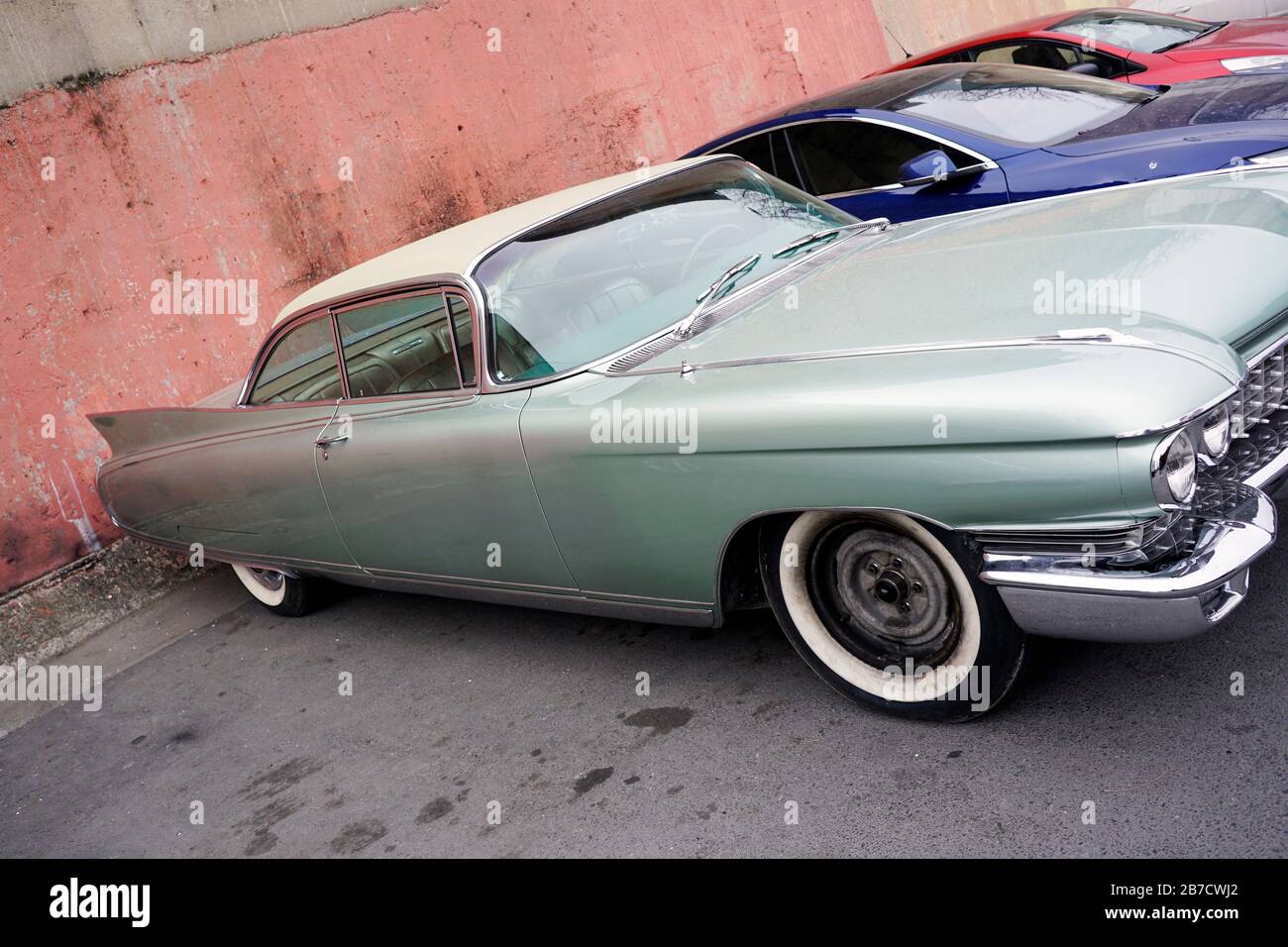 Classic vintage wrecked junk cars in the street Stock Photo - Alamy