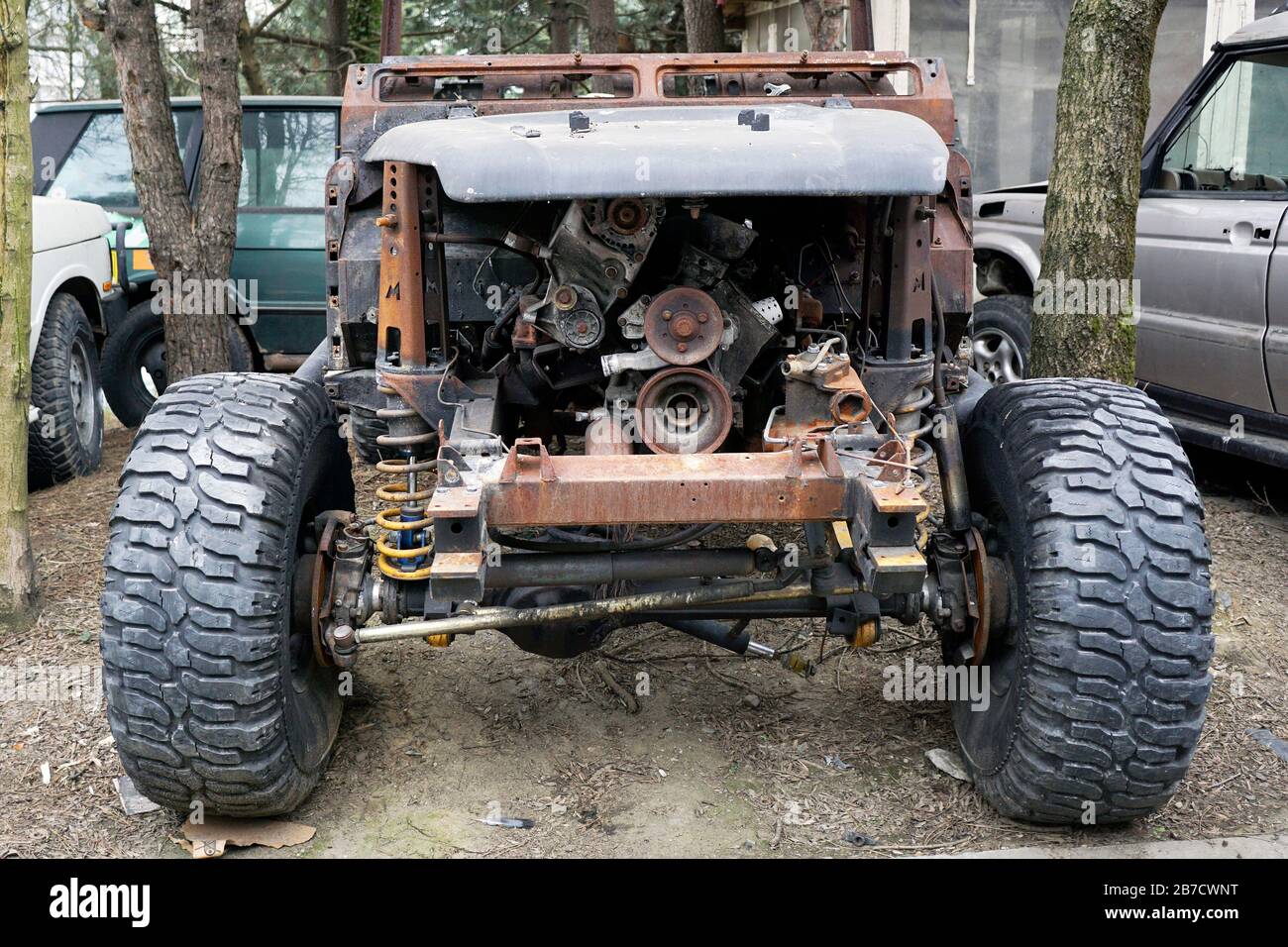 Classic vintage wrecked junk cars in the street Stock Photo - Alamy