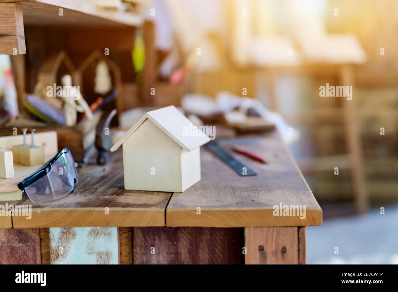 Carpenter working in carpentry shop. Woodwork for furniture and home ...