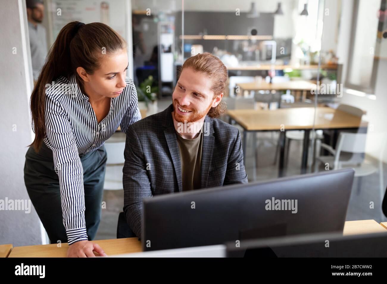 Programmer working in a software developing company Stock Photo - Alamy