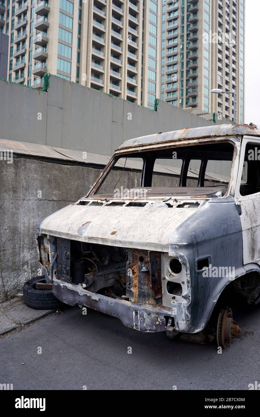Classic vintage wrecked junk cars in the street Stock Photo - Alamy